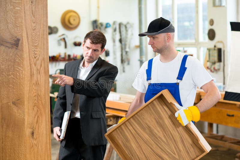 Boss and Worker in a Carpenter S Workshop Stock Image - Image of chief ...