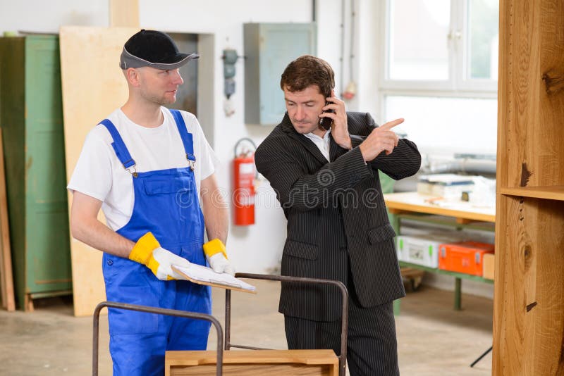Boss and Worker in a Carpenter S Workshop Stock Image - Image of ...