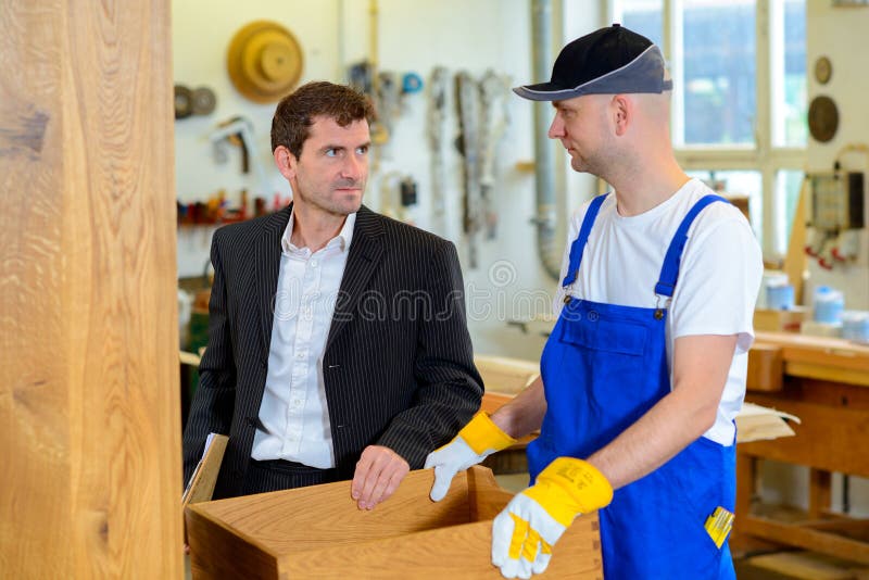 Boss and Worker in a Carpenter S Workshop Stock Image - Image of ...