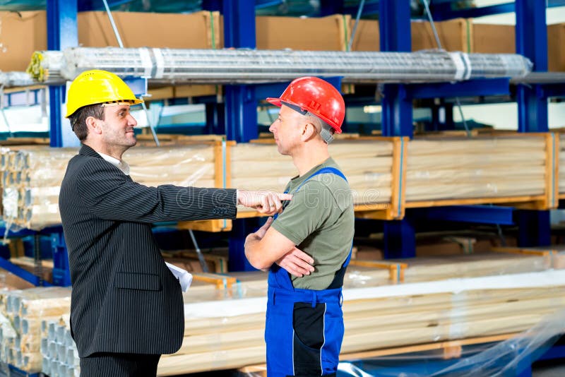 Boss and Worker in Conversation Stock Photo - Image of industrial ...