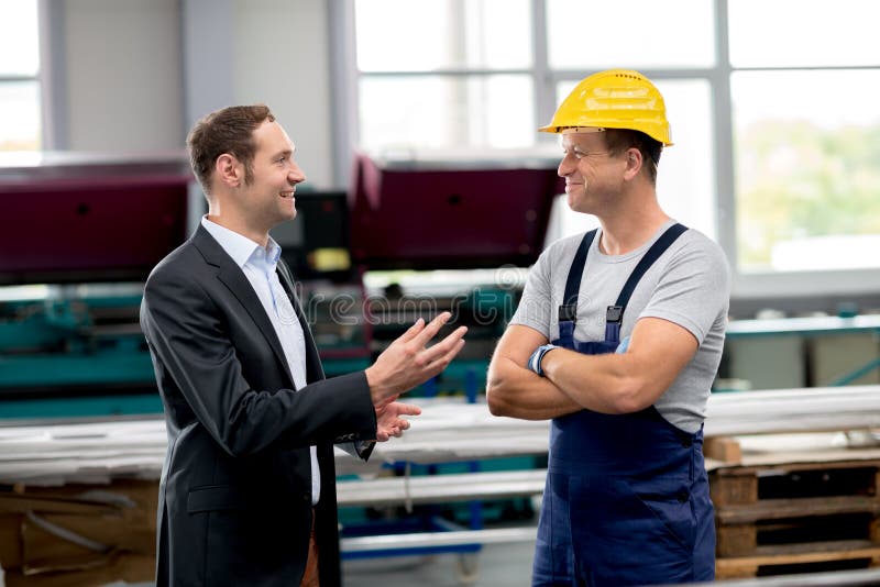 Boss and Worker in Conversation Stock Image - Image of controller ...