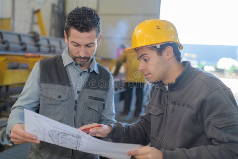 Boss and Worker Discussing Plans Stock Photo - Image of operator ...