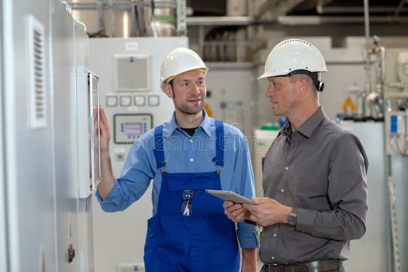 Boss and Worker in Conversation Stock Photo - Image of industry ...