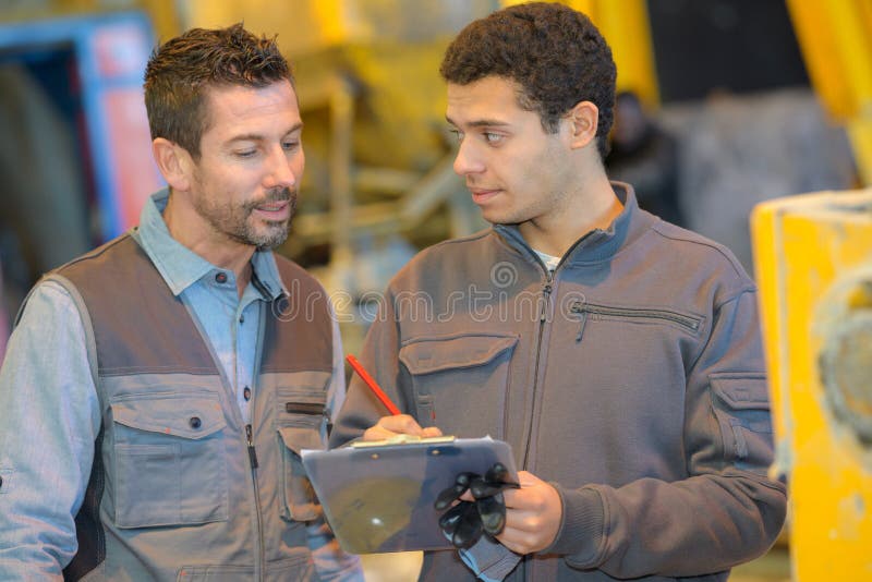 Boss And Worker In Conversation Stock Photo - Image of industry ...