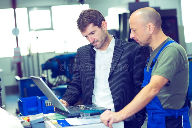 Boss and Worker on Work Bench Stock Photo - Image of management ...