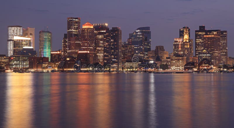 Boston Skyline and Harbor Illuminated at Night Reflected on the ...