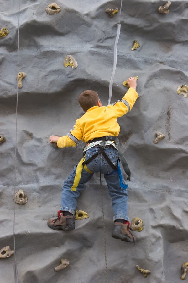 Bot Climbing Rock Wall stock image. Image of safety, recreation - 1289139