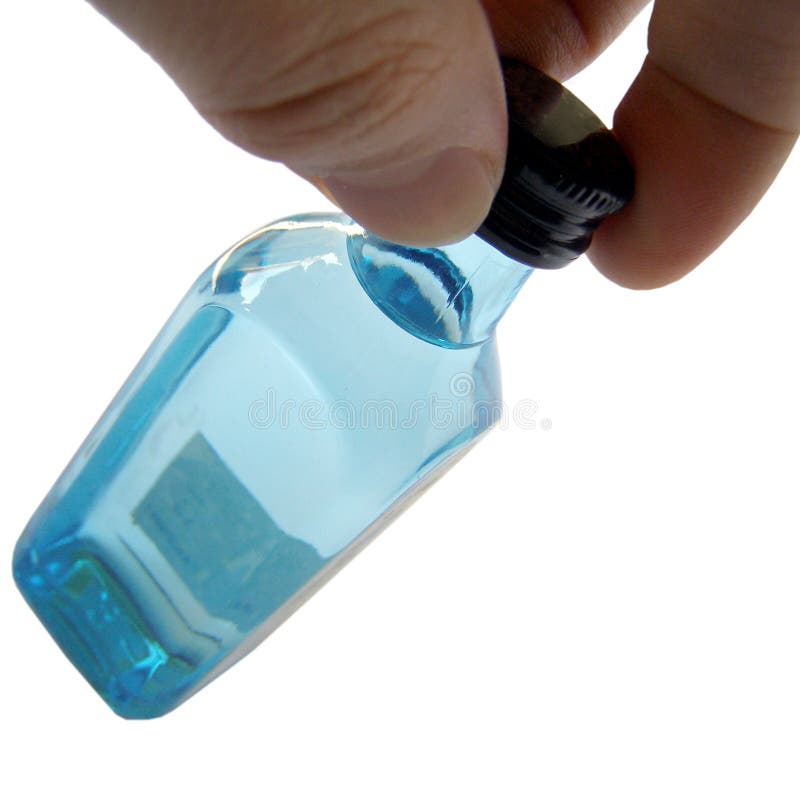 Botella azul de alcohol foto de archivo. Imagen de tequila - 4791694