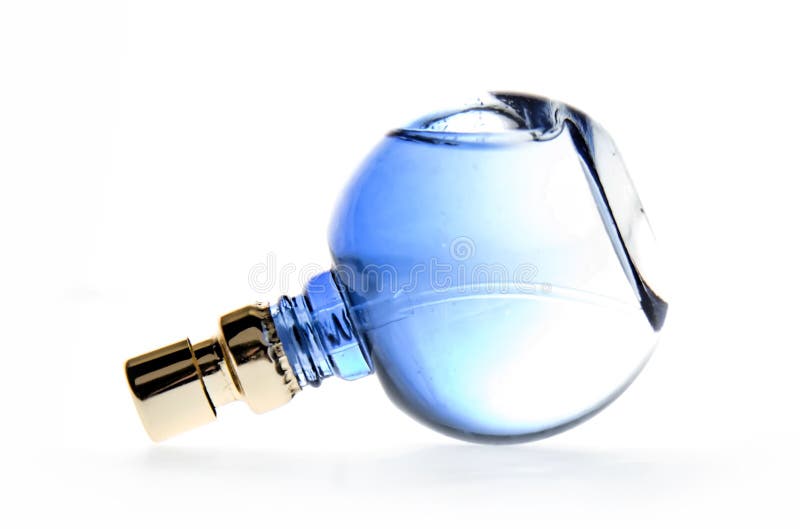 Botella de perfume azul imagen de archivo. Imagen de aislado - 12506055