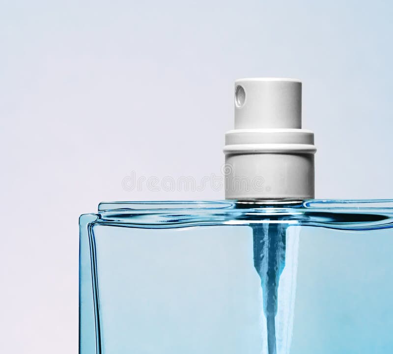 Botella de perfume azul imagen de archivo. Imagen de aroma - 12539099