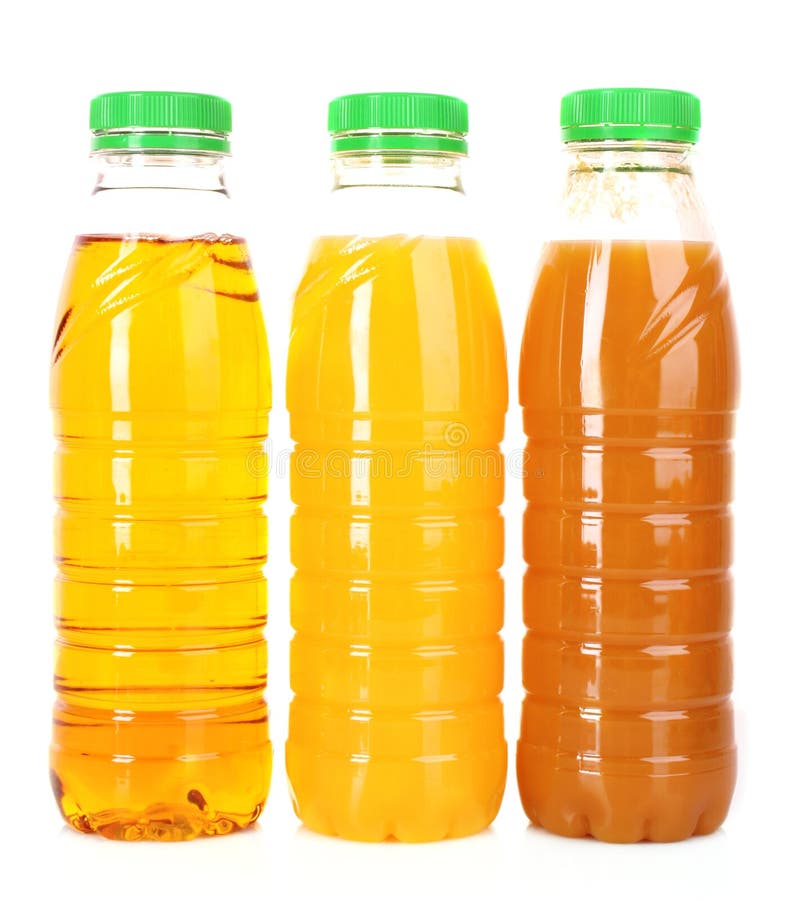 Botellas De Jugo Con Las Frutas Maduras Foto de archivo - Imagen de ...