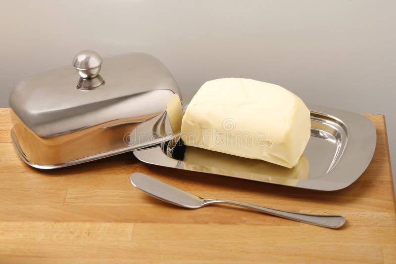 Boter stock foto. Image of metaal, geel, boter, dekking - 29828728