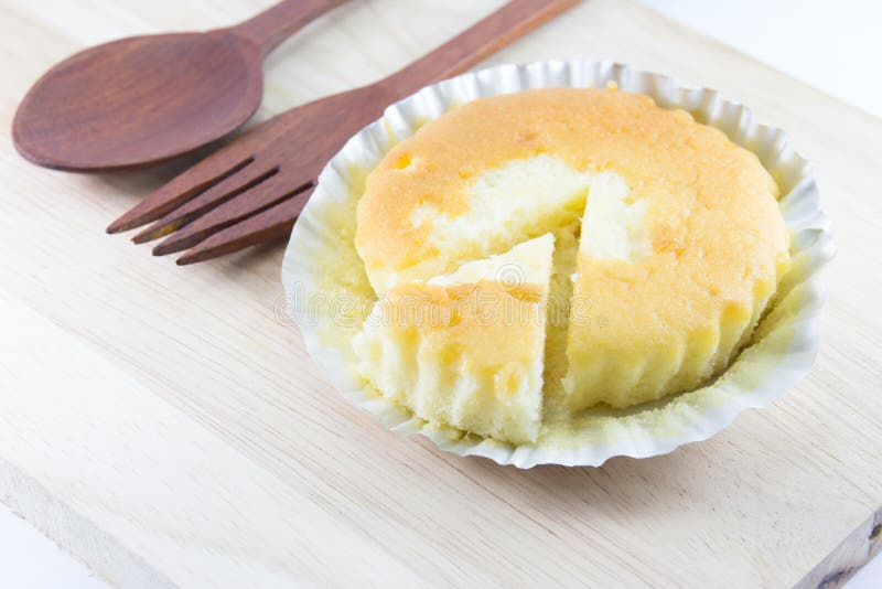 Botercake in Foliekop Op Houten Bureau Stock Foto - Image of eten ...