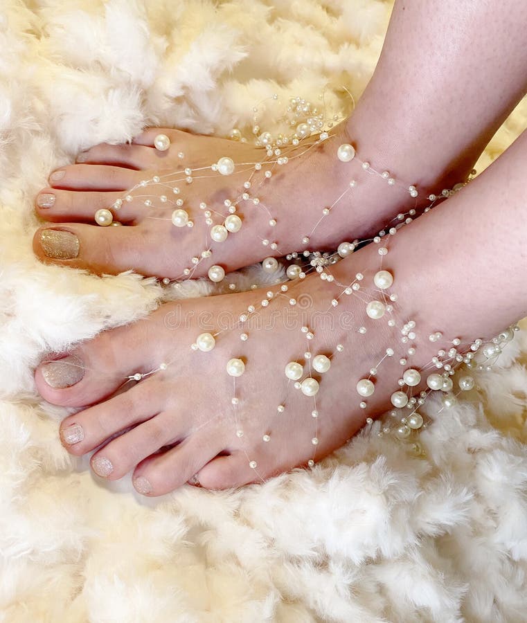 Side View of Bare Feet Wrapped in Vintage String Pearls Stock Image ...