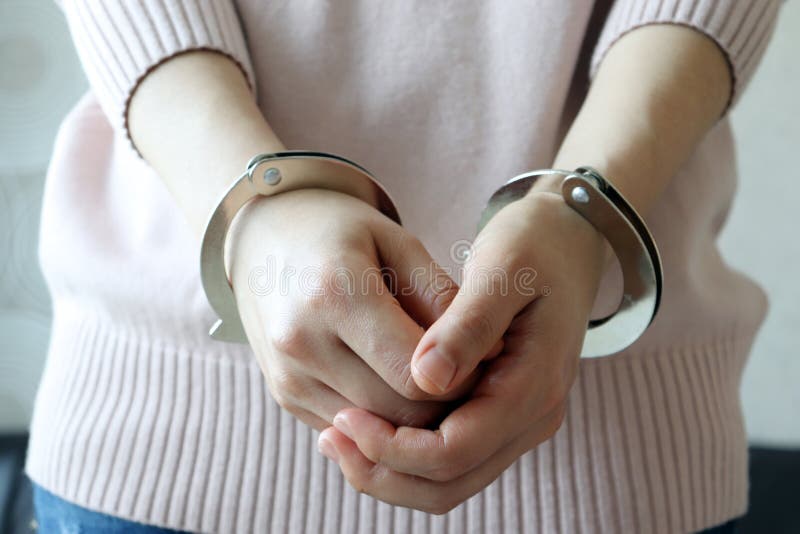 The Both Hands of a Woman in Handcuffs. Stock Photo - Image of girl ...