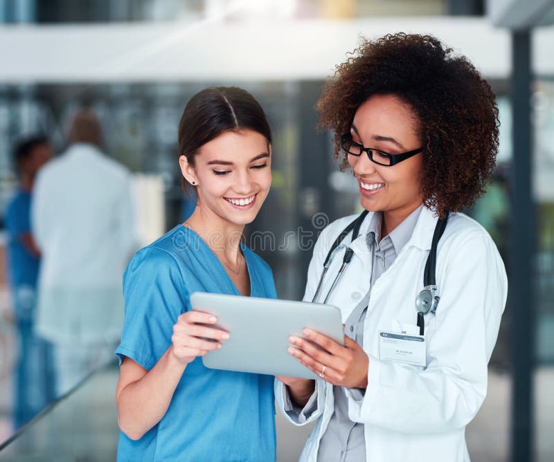 They are Both Happy with Their Achievement. Two Cheerful Young Doctors ...