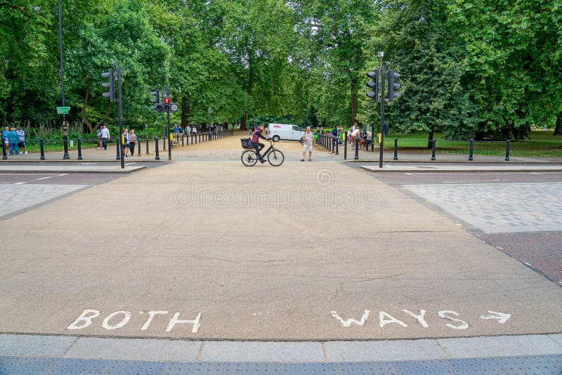 Both Ways Indication Written on the Cycle Path Pavement in Hyde Park ...