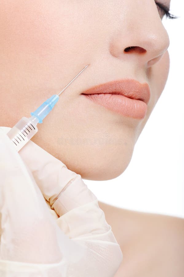 Botox shot on female cheek stock image. Image of beauty - 10814587