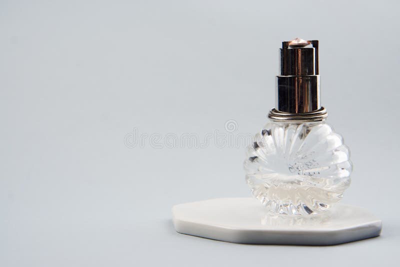 Bottle with Aromatic Liquid Perfume Cologne Light Background. Stock ...