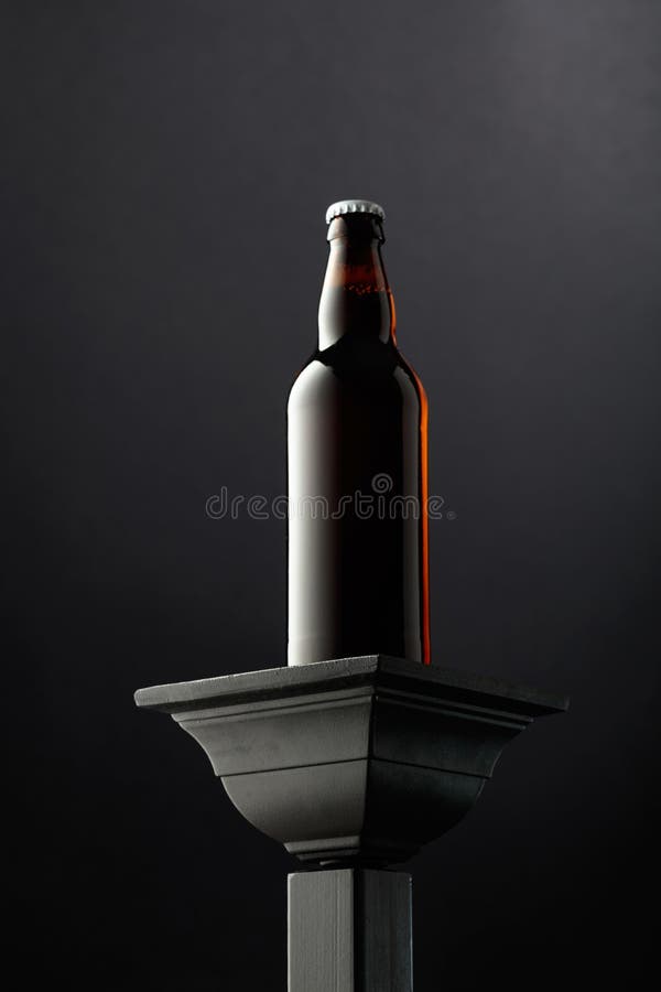 Bottle of Beer on a Black Podium Stock Photo - Image of food, alcohol ...