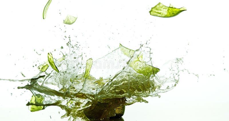 Bottle of Beer Breaking and Splashing Against White Background Stock ...