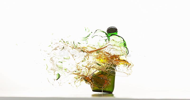 Bottle of Beer Falling, Breaking and Splashing on Steel Plate Against ...
