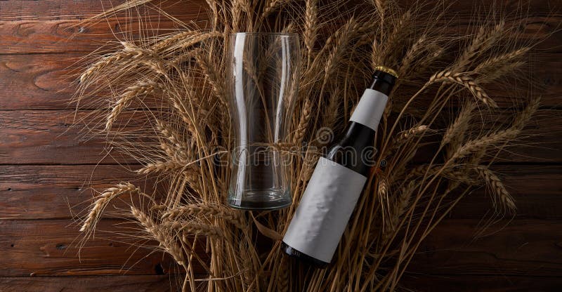 Bottle of Beer and Empty Glass Lie on the Ears of Rye Stock Photo ...