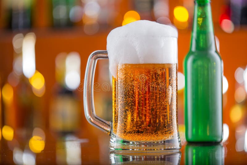 Bottle of Beer with Glass on Bar Desk Stock Image - Image of cool ...