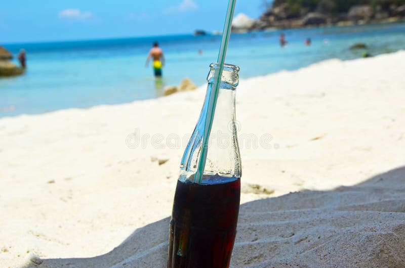 Bottle of Brown Soda on the Beach Stock Image - Image of soda, cold ...