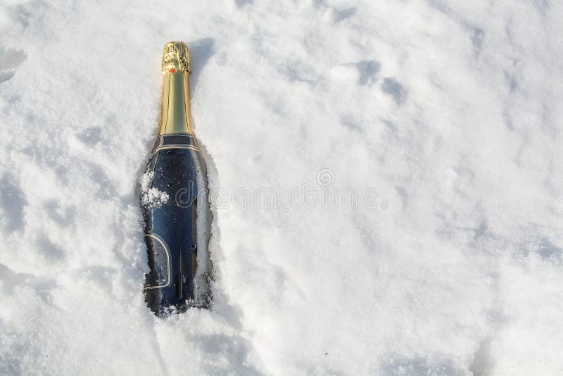 Bottle of Champagne is Lying in Snow. Stock Photo - Image of drink ...