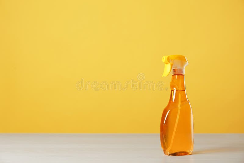 Bottle of Cleaning Product on Light Table. Space for Text Stock Photo ...