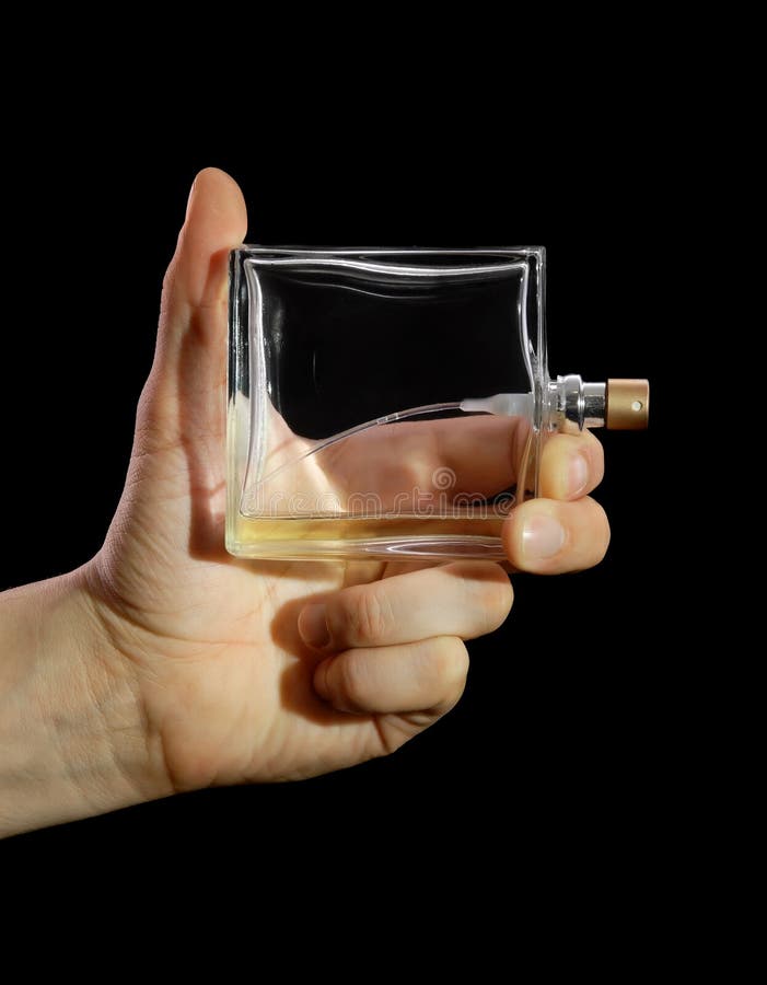 Bottle of Cologne in a Hand at the Man Stock Photo - Image of ...