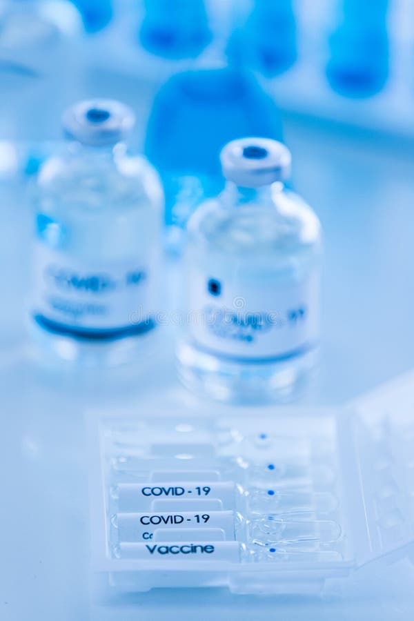 Bottle of COVOD-19 Vaccine Sample in a Laboratory. Idea for Researching ...