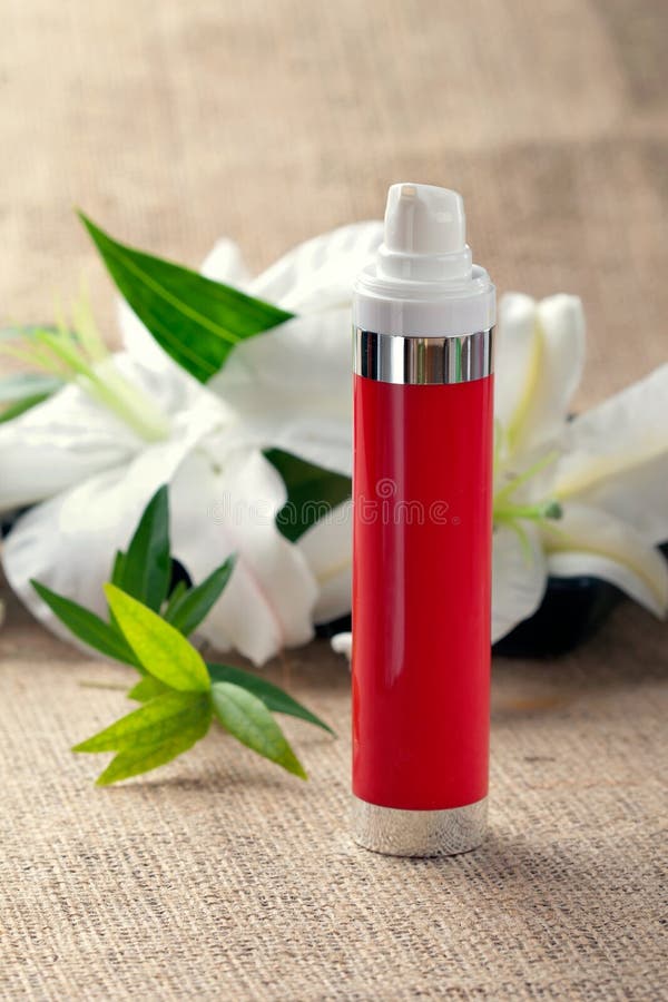 Bottle of Cream/lotion with Lilies Stock Image - Image of beauty ...