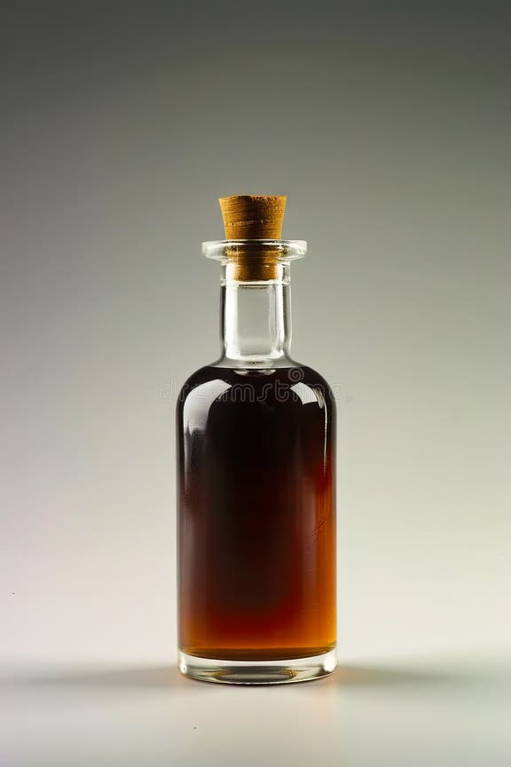 A Bottle of Dark Liquid with a Cork Top Stock Photo - Image of cork ...
