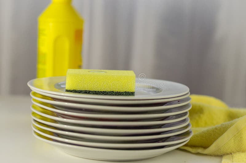Bottle of Dishwashing Liquid and Stack of Utensils Stock Photo - Image ...
