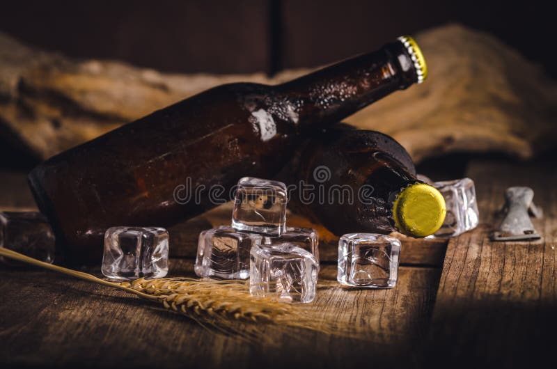 Bottle Draft Beer and Ice on Wooden Table Stock Photo - Image of brew ...