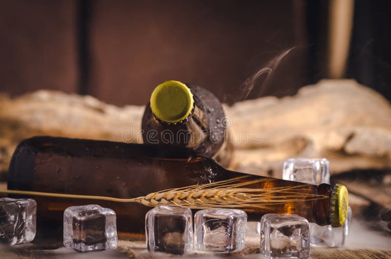 Bottle Draft Beer and Ice on Wooden Table Stock Photo - Image of amber ...