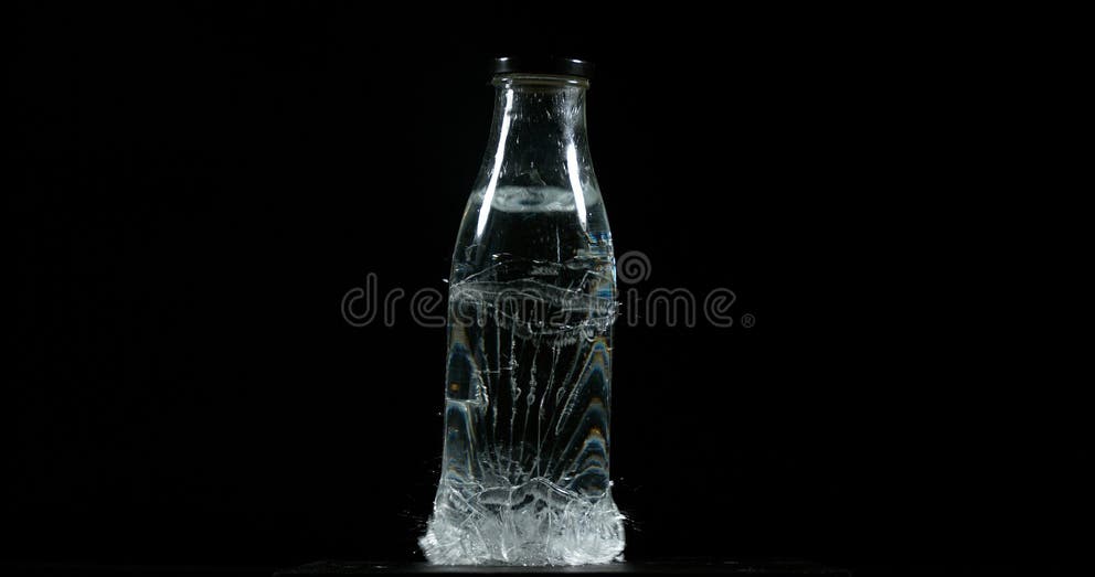Bottle Falling and Exploding on Black Background Stock Image - Image of ...