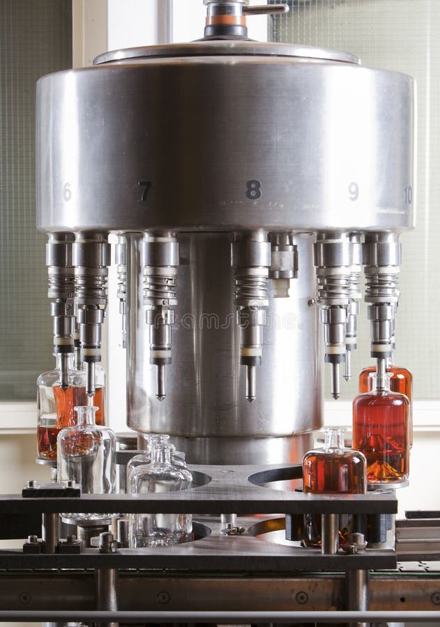 Bottle filling machine stock photo. Image of liquor, factoryalcohol ...