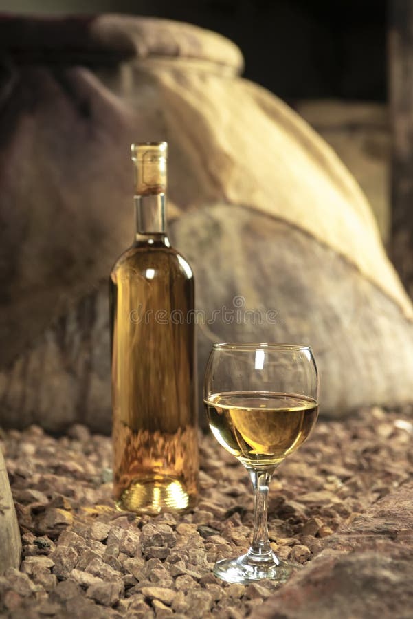 Bottle and Glass of White Wine . Stock Photo - Image of motion, drink ...