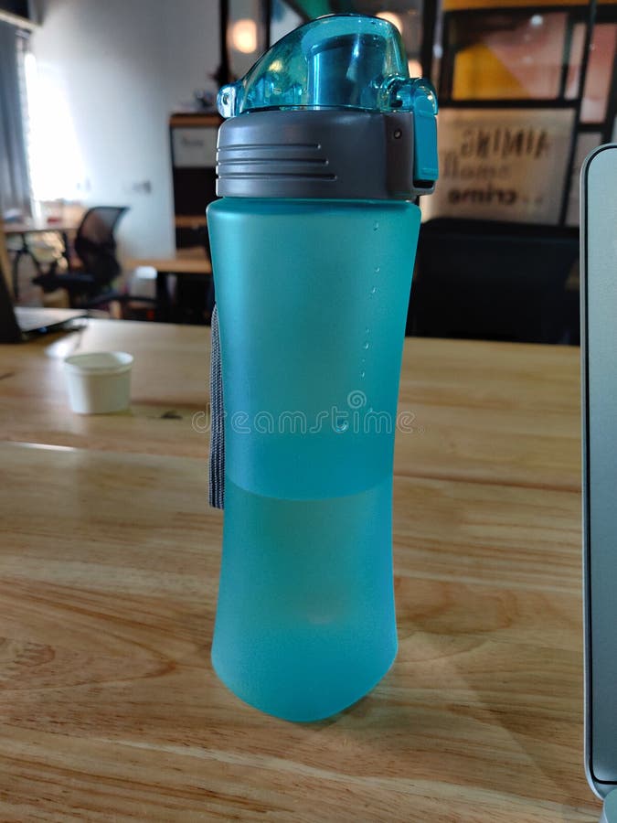 Bottle Half Filled Water Blue Stock Image - Image of filled, water ...