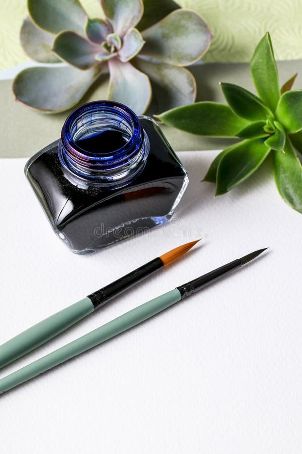 Bottle of Ink, Brushes and Sheet of Paper Stock Photo - Image of ...