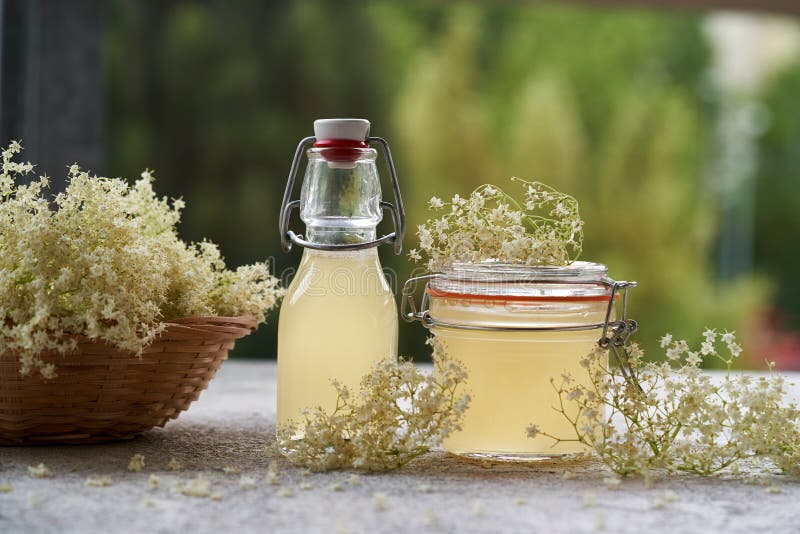 A Bottle and a Jar of Healthy Elderberry Flower Syrup Made in ...