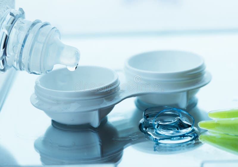 Bottle with Lens Solution and Case on Table Stock Image - Image of blue ...
