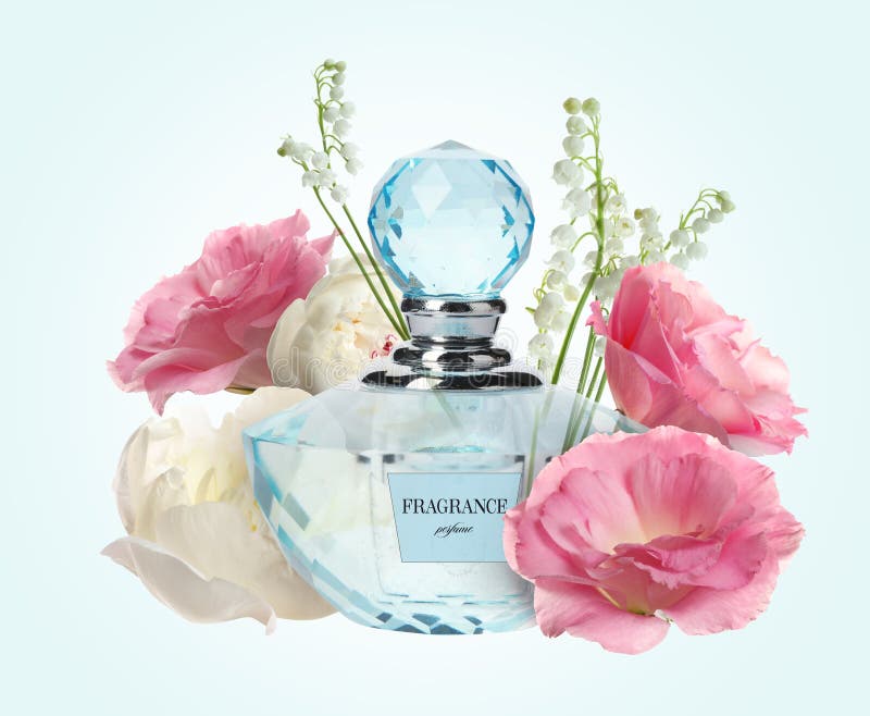 Bottle of Luxury Perfume and Beautiful Flowers on Light Blue Background ...