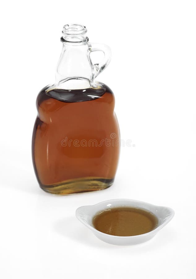 Bottle of Maple Syrup Against White Background Stock Image - Image of ...