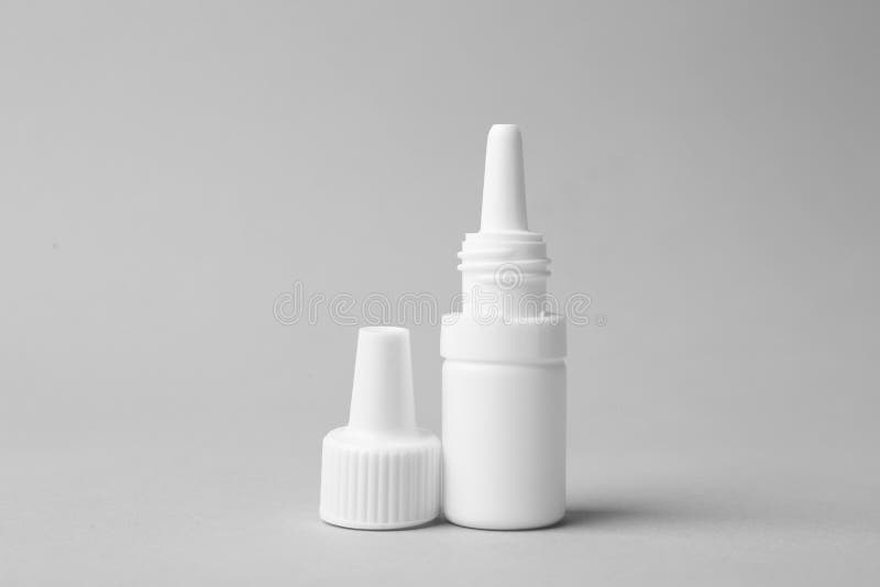 Bottle of Medical Drops on Grey Background Stock Photo - Image of ...