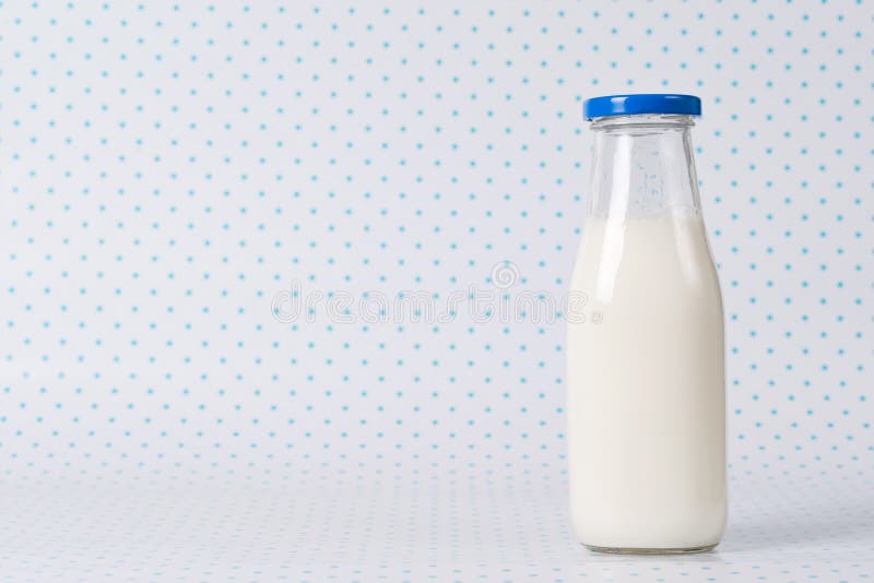 Bottle of Milk with Blue Cap on Polka Dots Background Stock Image ...
