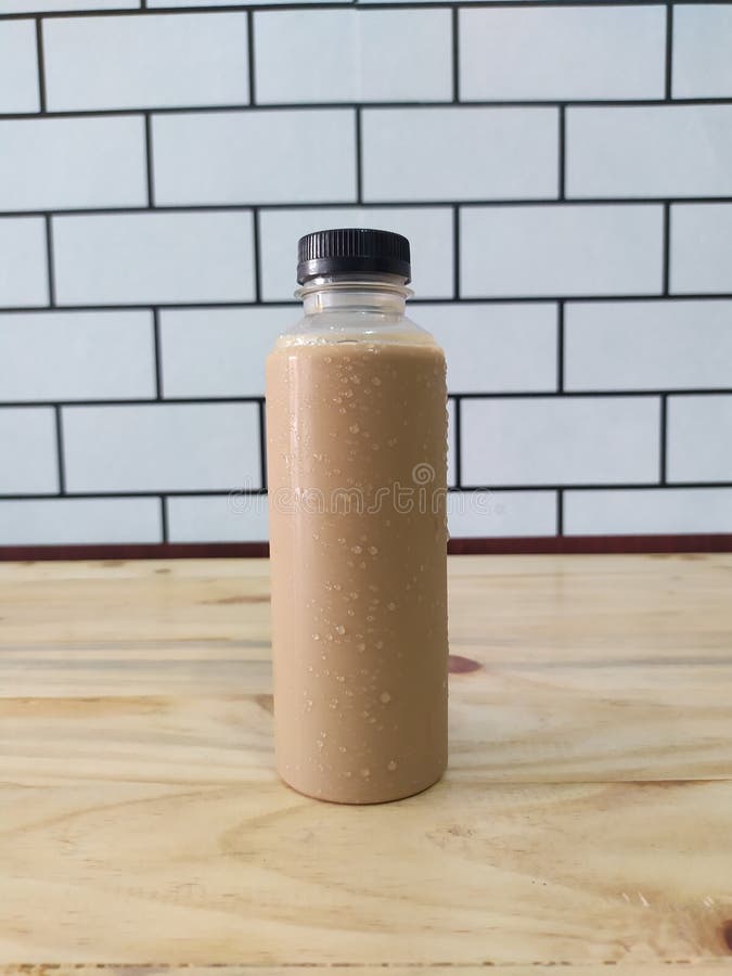 A Bottle of Milk Coffee Brown Sugar Stock Image - Image of table ...